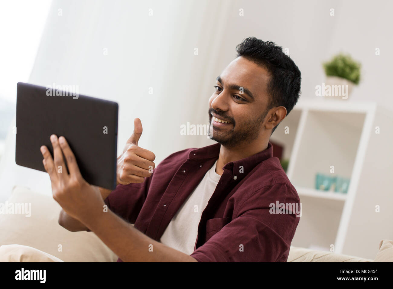 Video chat happy young indian hi-res stock photography and images - Alamy
