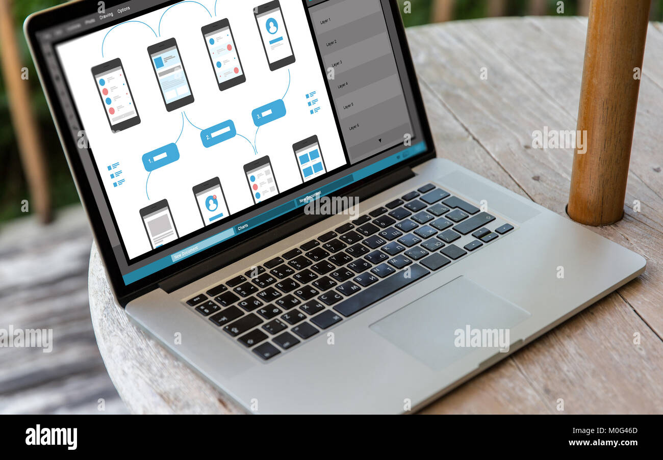 laptop with smartphone interface design on screen Stock Photo - Alamy