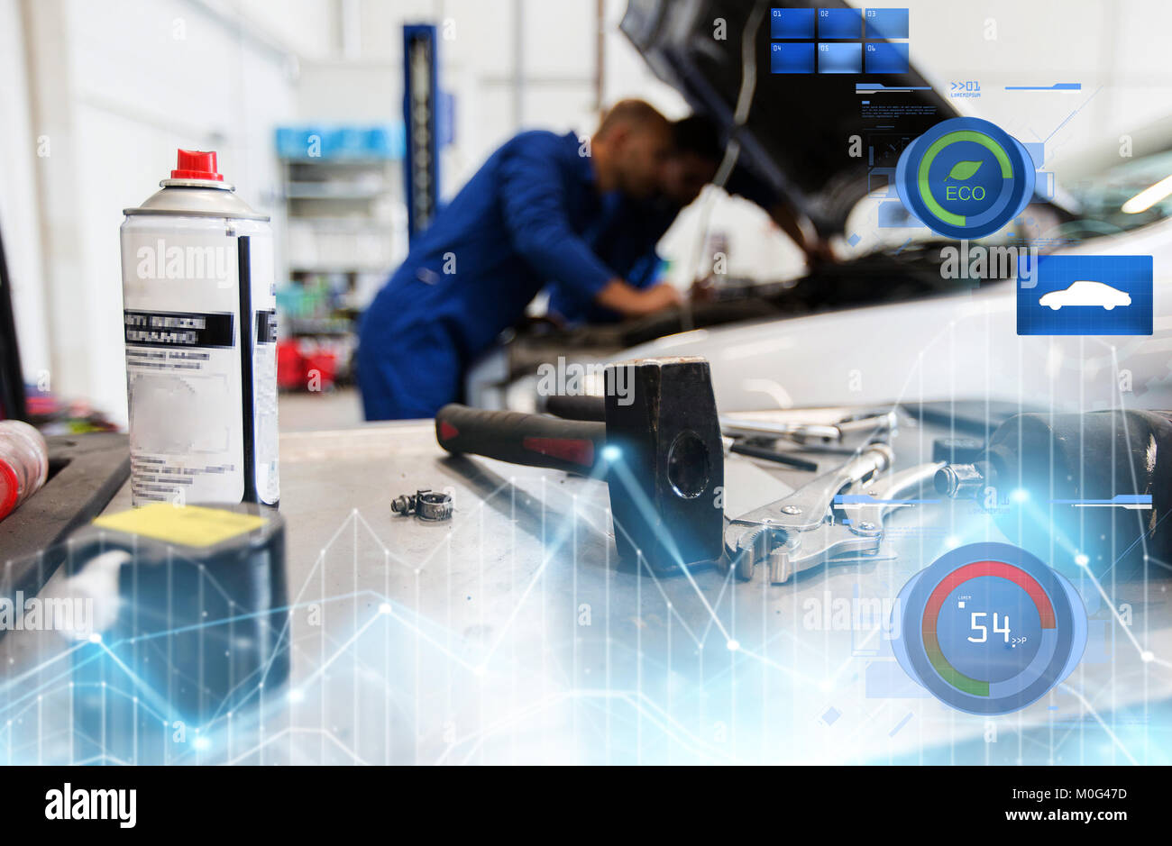 working tools and men repairing car at workshop Stock Photo - Alamy