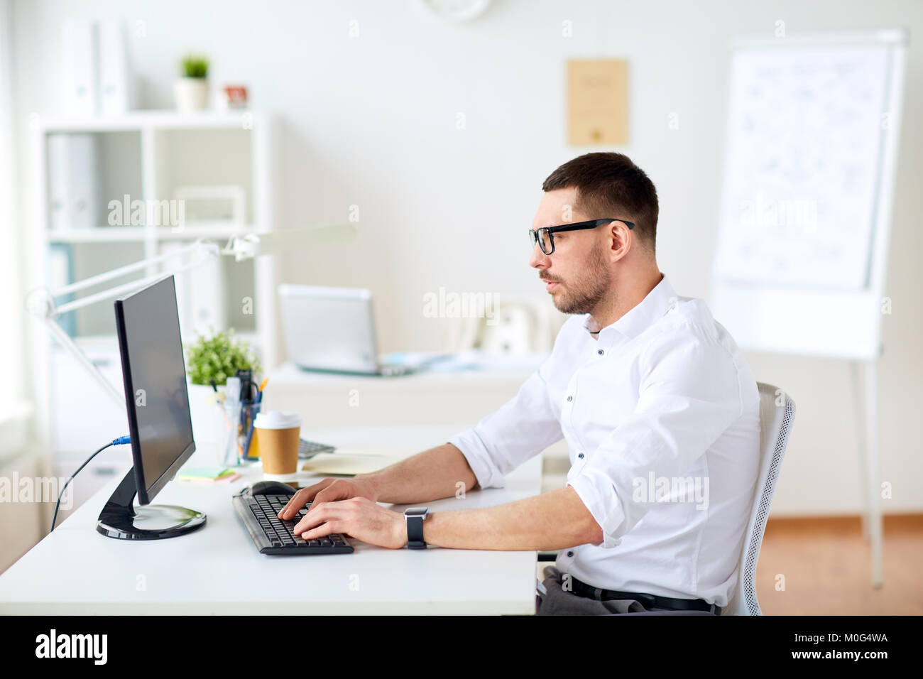 businessman typing on computer keyboard at office Stock Photo - Alamy