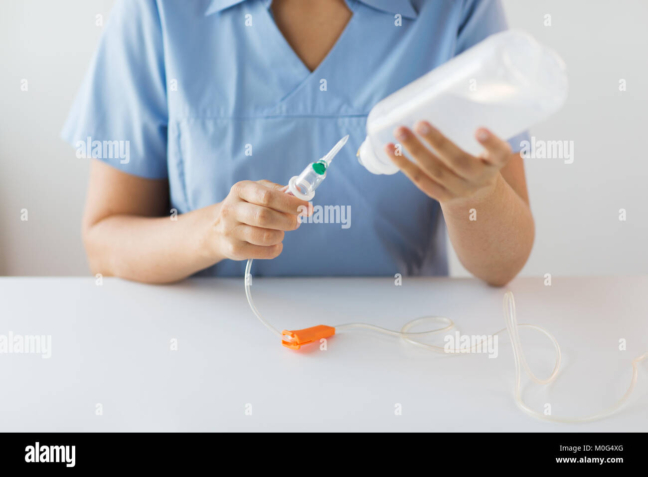 close up of nurse preparing drop counter Stock Photo - Alamy