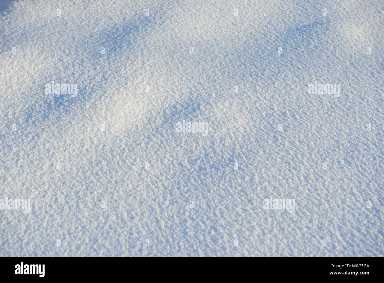 snow for texture or background at sunny day, bright light with shadows ...