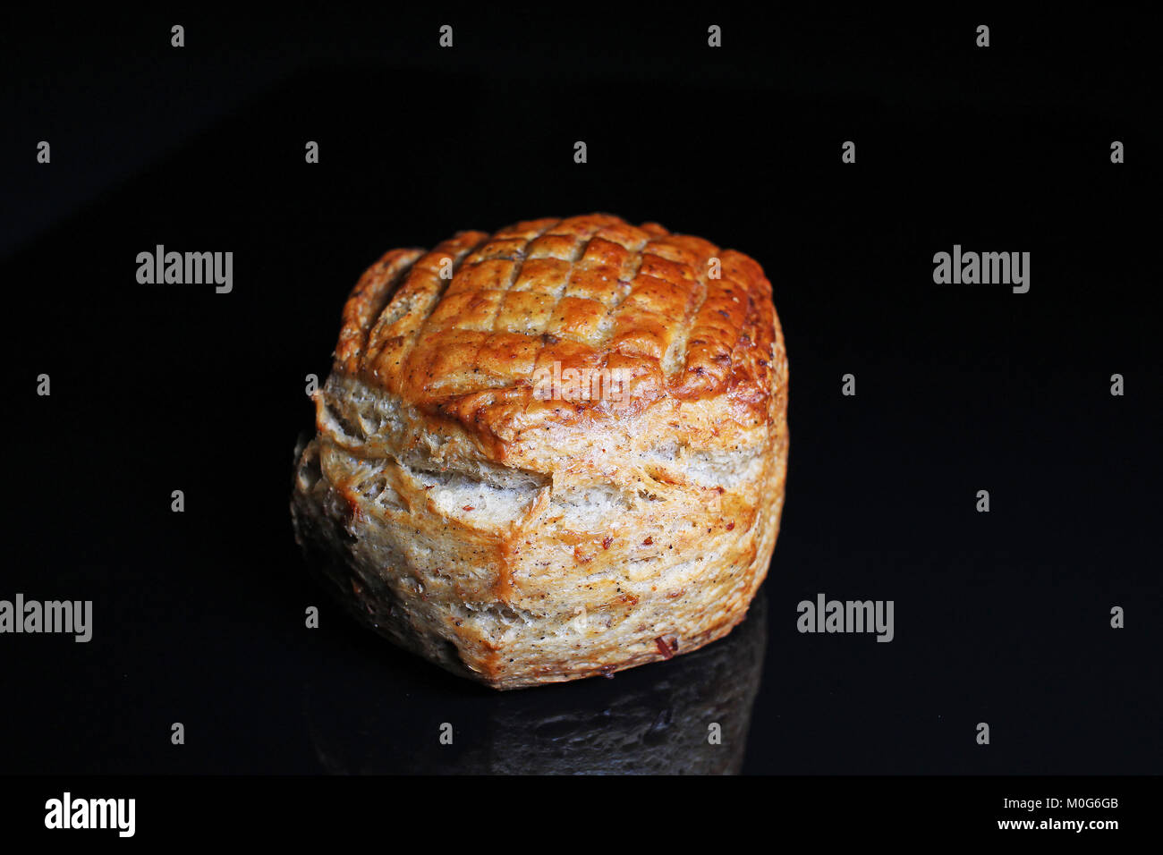 Scone. Pastry round scone on black reflective studio background ...
