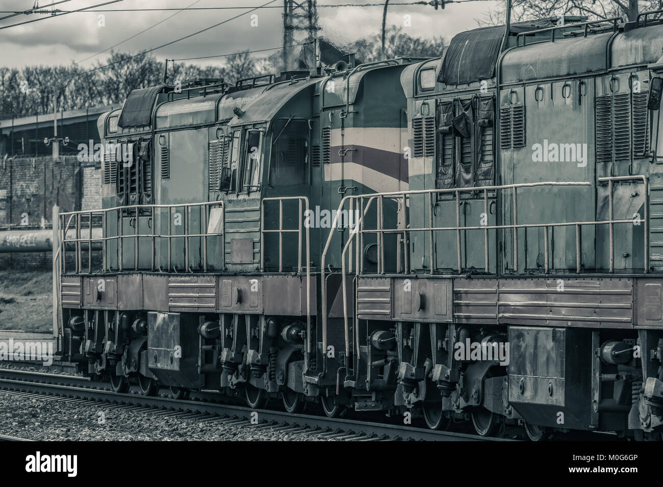 Old diesel cargo locomotive. Freight train in action Stock Photo - Alamy