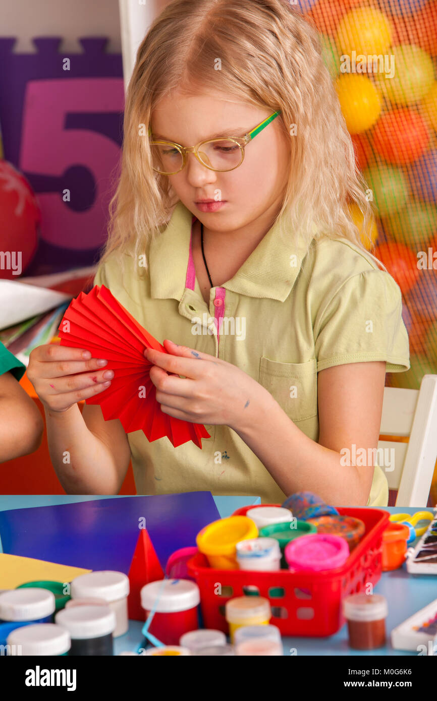 School children with scissors in kids hands cutting paper Stock Photo ...