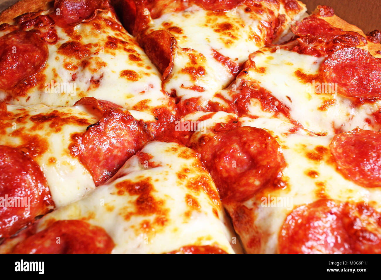Pizza texture. Pizza on black reflective studio background. Isolated ...