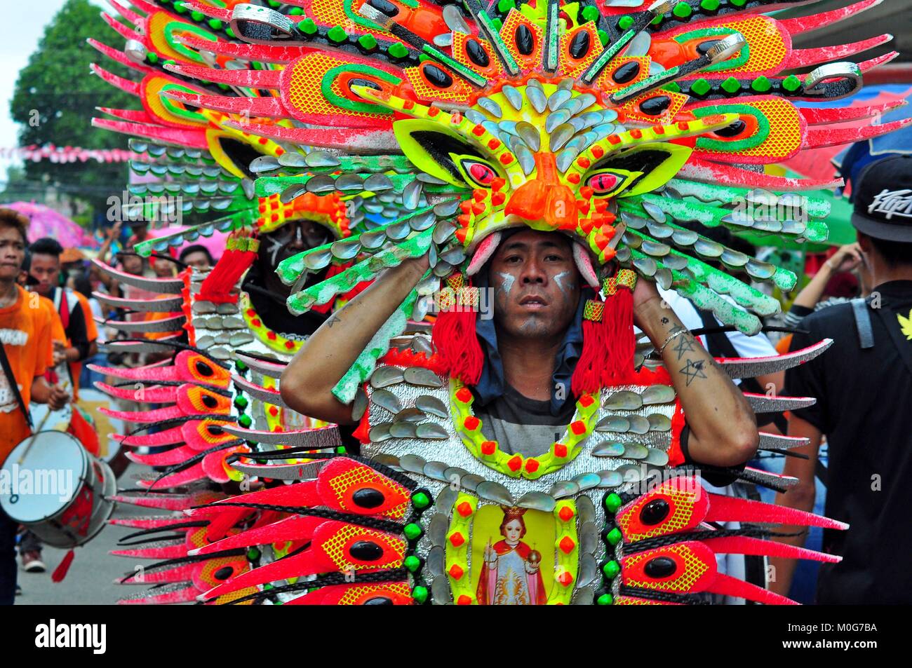 Kalibo, Philippines. 20th Jan, 2018. The name Ati-Atihan means "make ...