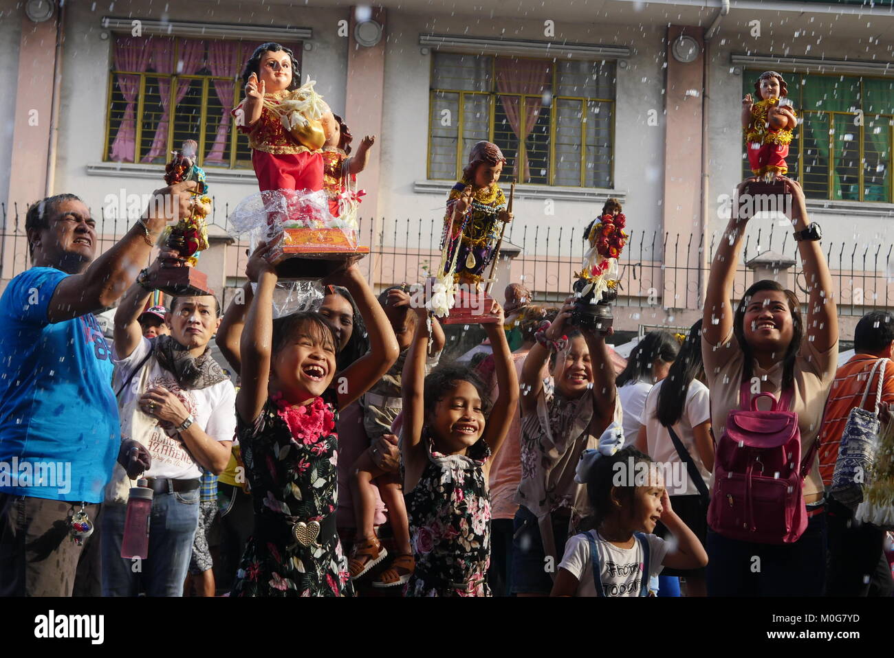 Manila, Philippines. 21st Jan, 2018. Kids are happy as their Sto. Nino ...