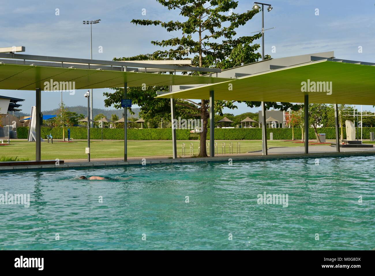 Man swimming freestyle in Riverway pool, Townsville, Queensland ...