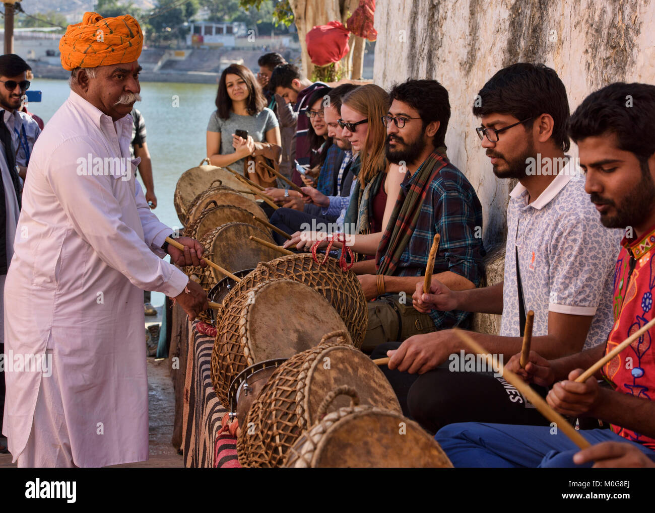 Renowned Rajasthani drummer Solanki Nathu Lal teaches students, Pushkar ...
