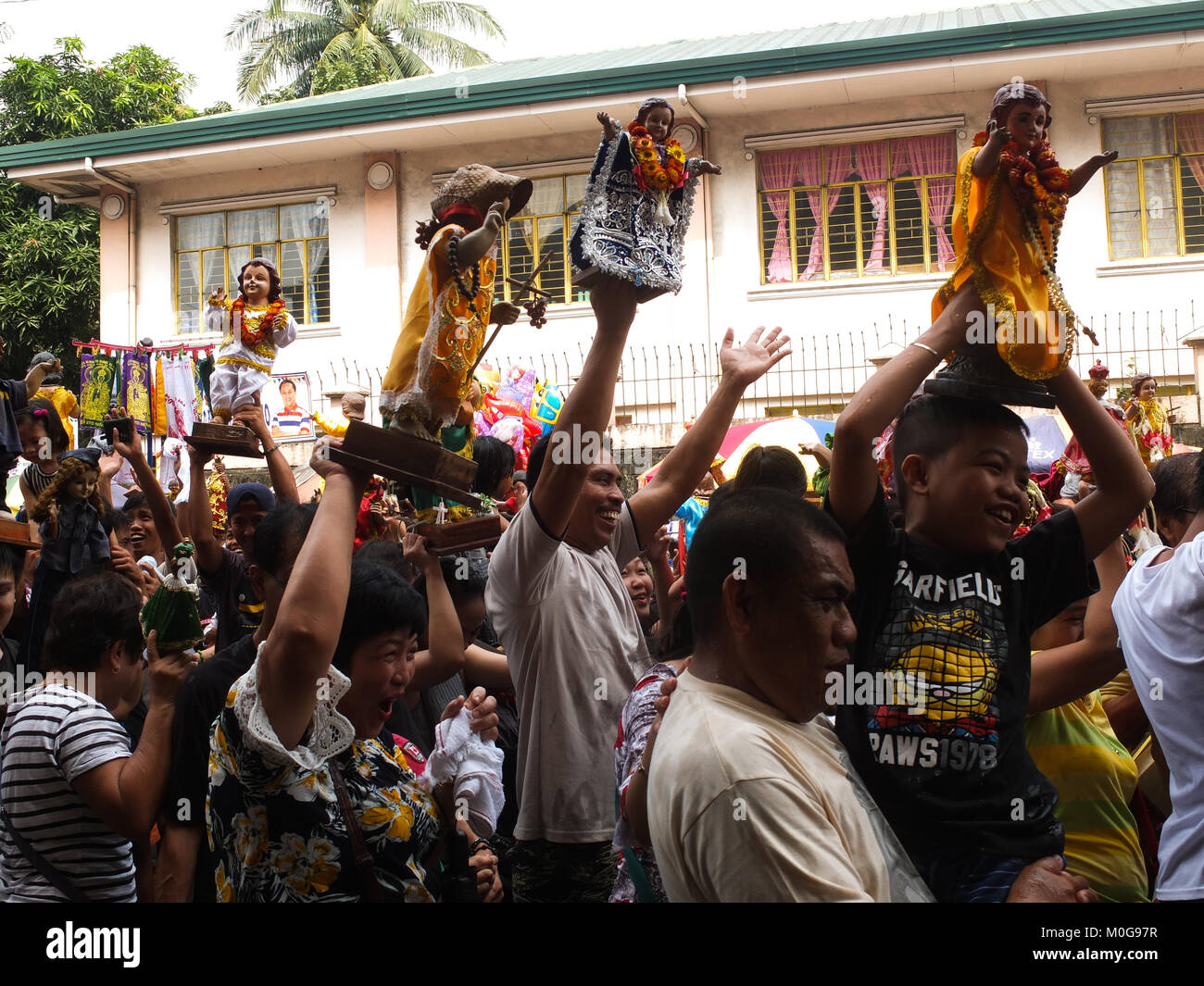 Manila, Philippines. 20th Jan, 2012. Devotees smiling as they walk ...