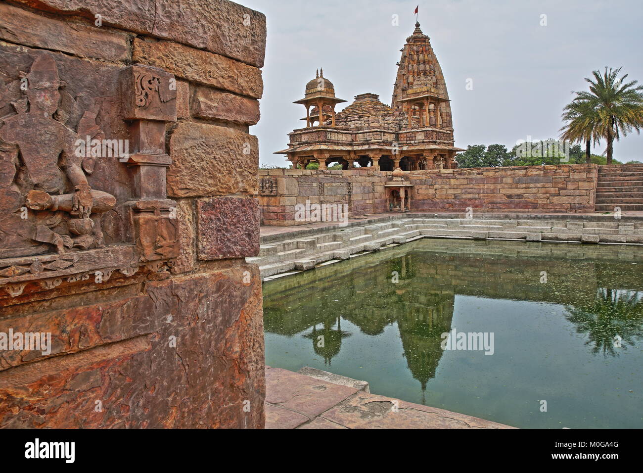 Hindu temple ( with reflections on a basin) in Bijolia, Rajasthan ...