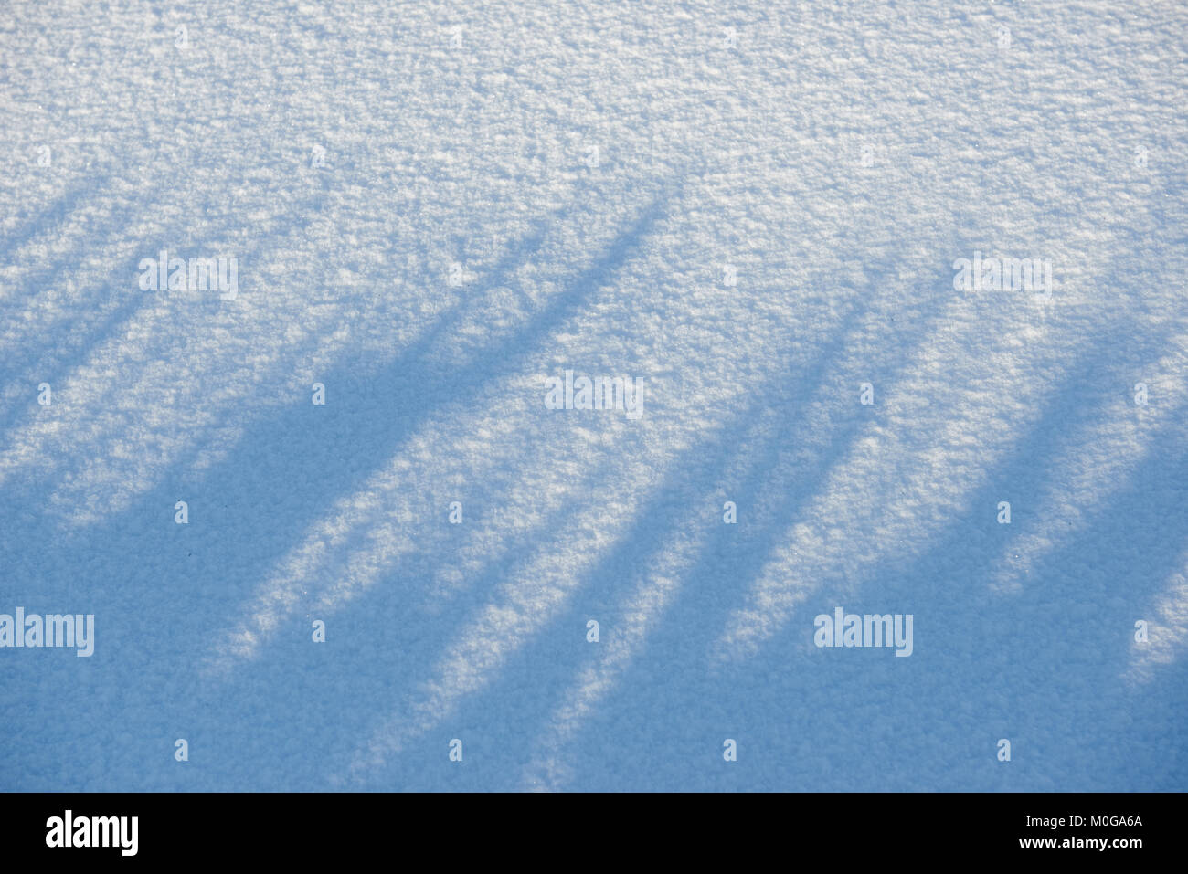 snow with shadows for texture or background at sunny day, bright light ...