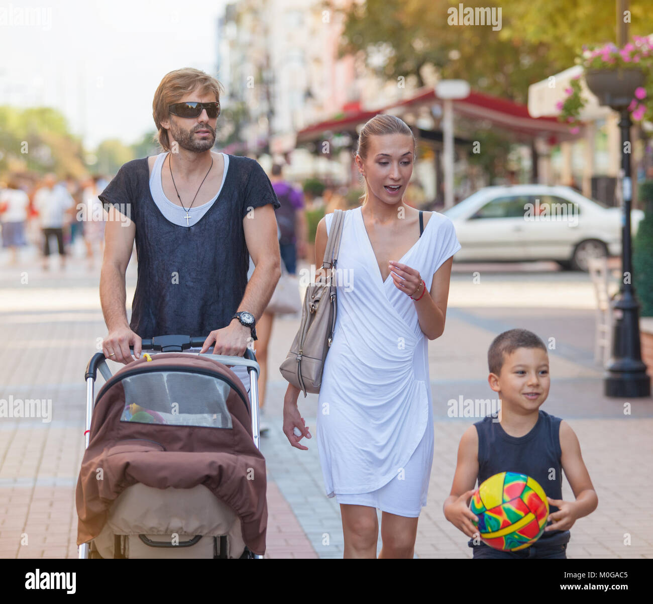 Family Walk Downtown Stock Photo - Alamy