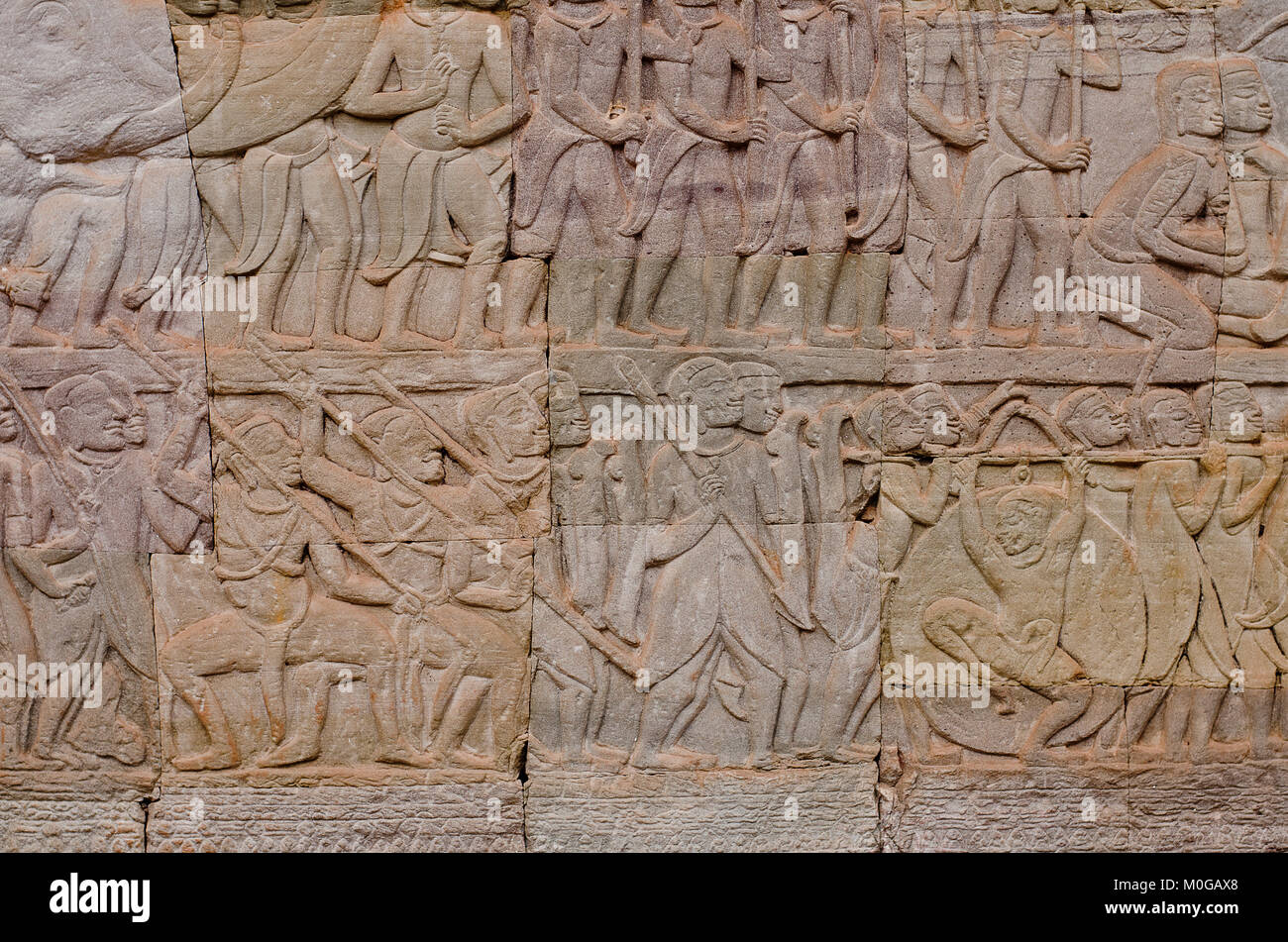 Bas relief symbols carved on stone walls in Ankor, Siem Reap Stock ...