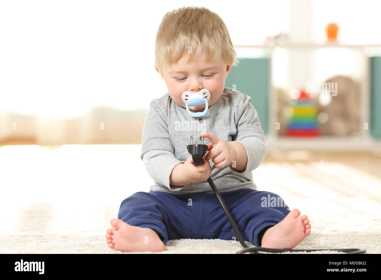 Safety plug child hi-res stock photography and images - Alamy