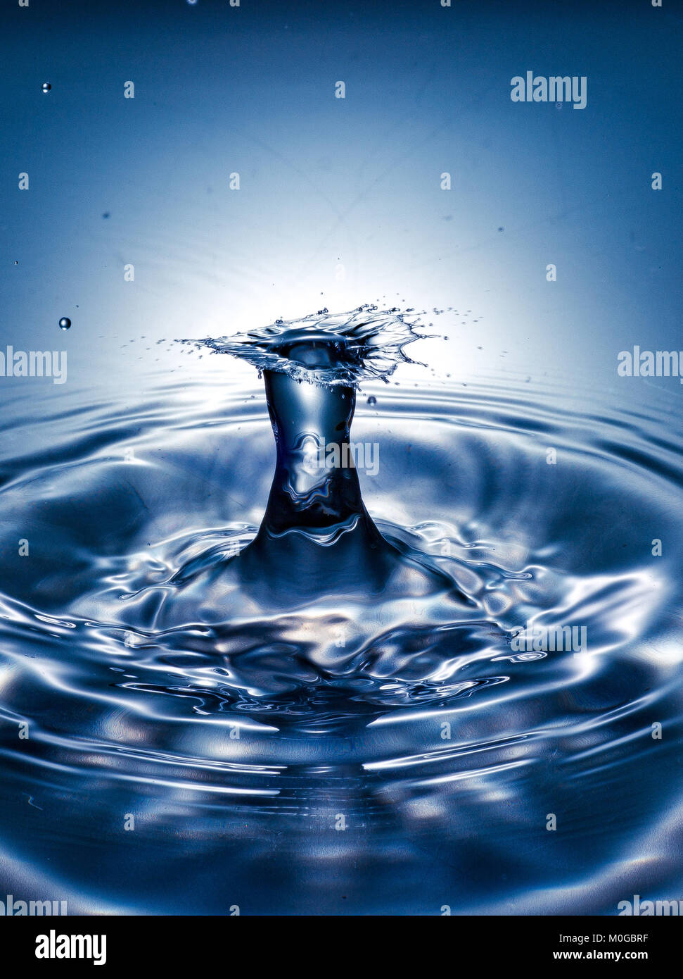 Waterdrop photography with drop on drop, crowns, splash Stock Photo - Alamy