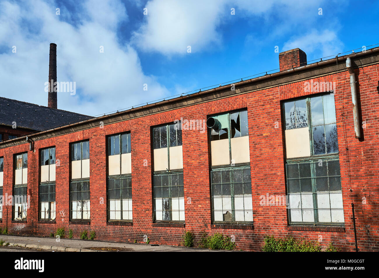 Abandoned factory hall with red brick in Gniezno Stock Photo - Alamy