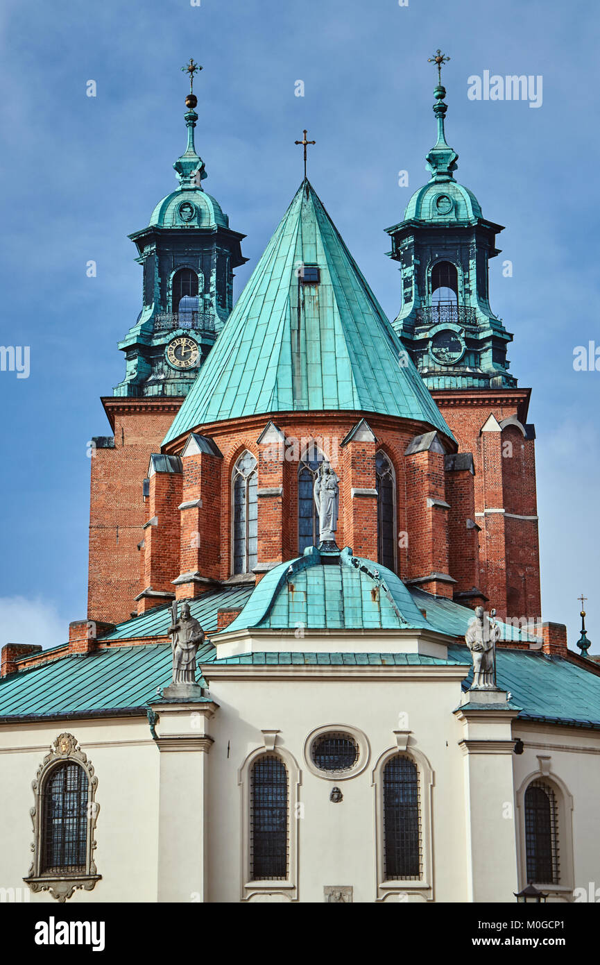 Towers and statues of the Basilica Archdiocese of Gniezno Stock Photo ...