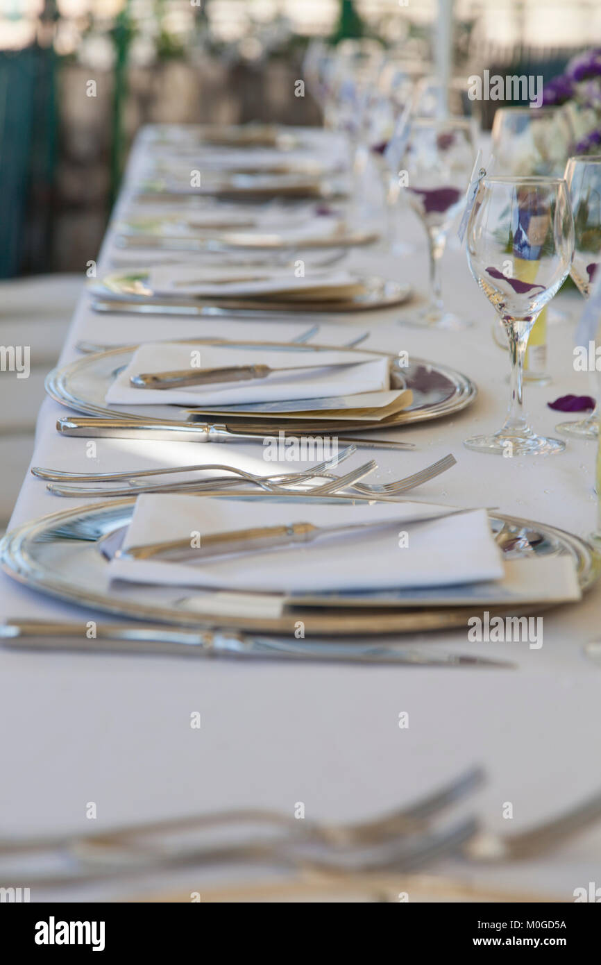 Wedding reception table set up for an event Stock Photo - Alamy