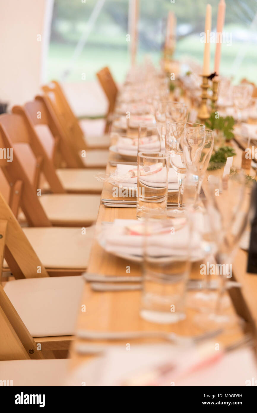 Wedding reception table set up for an event Stock Photo - Alamy