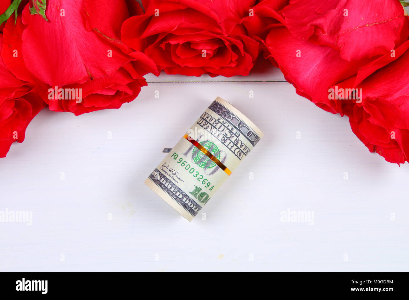 Red rose dollar money hi-res stock photography and images - Alamy