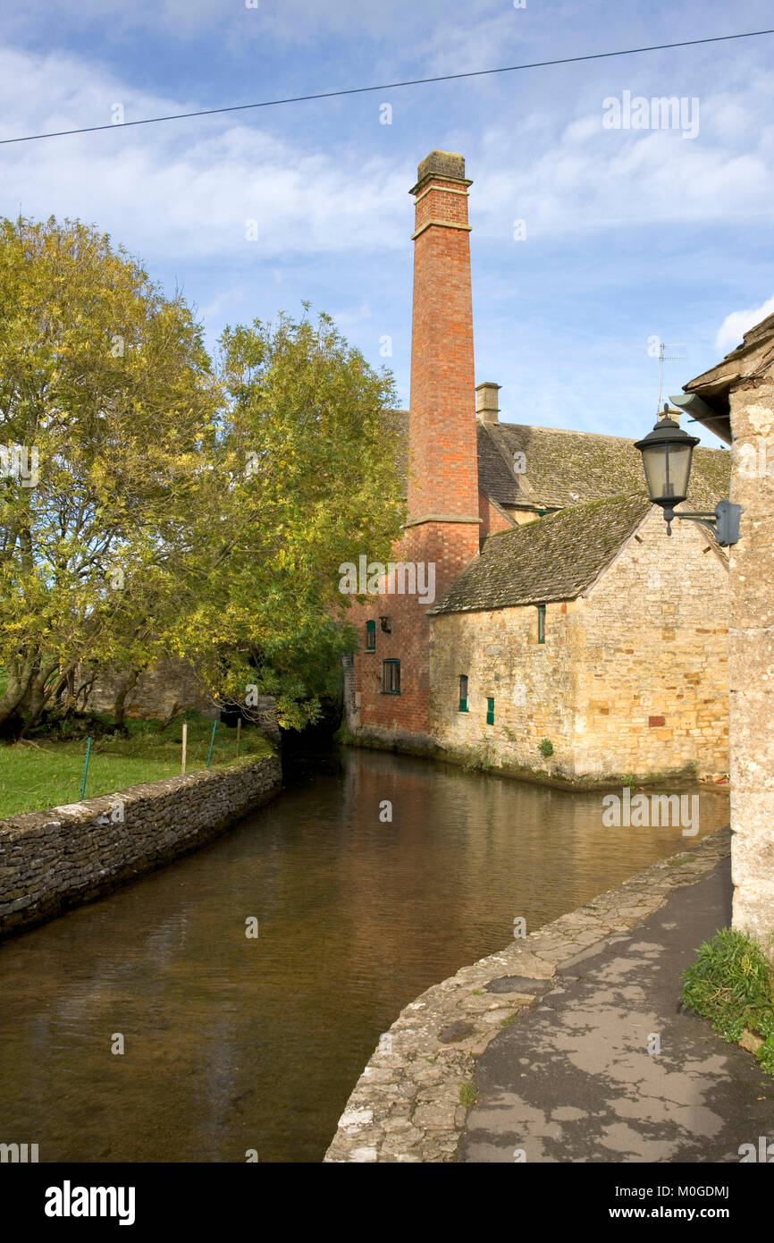 The old water mill, Lower Slaughter in autumn, Cotswolds ...