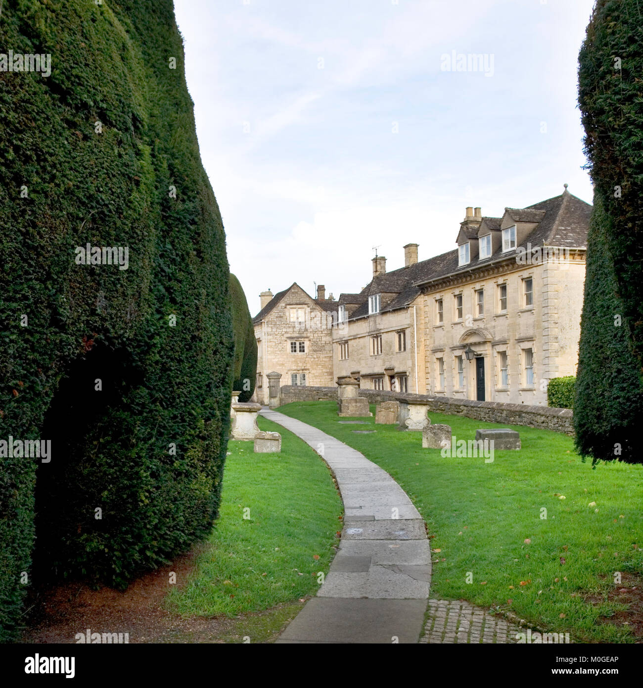 Painswick cotswolds churchyard yew tree hi-res stock photography and ...