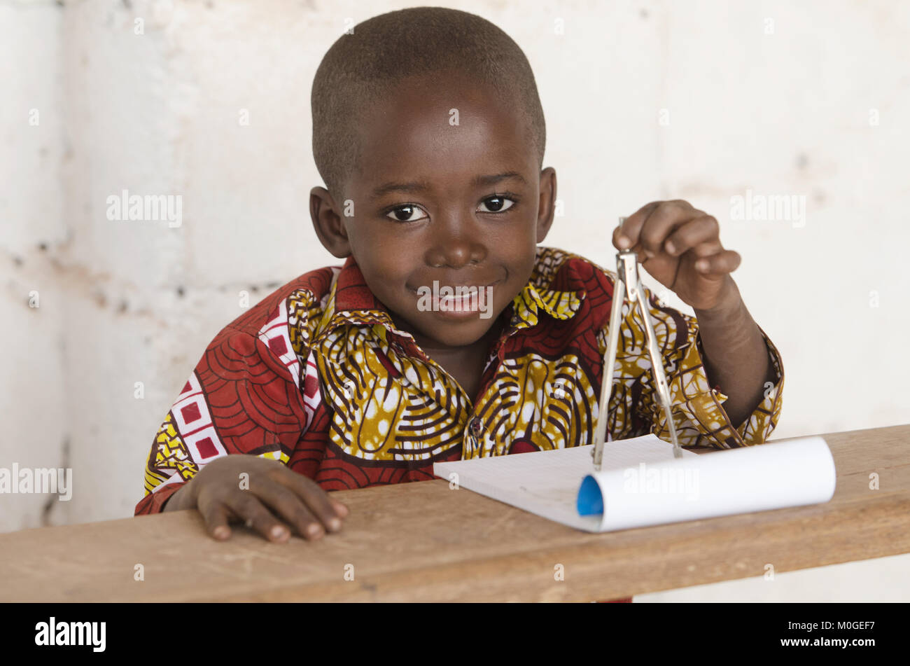 Boys in Science - Adorable African Boy Using a Compass during Geometry ...