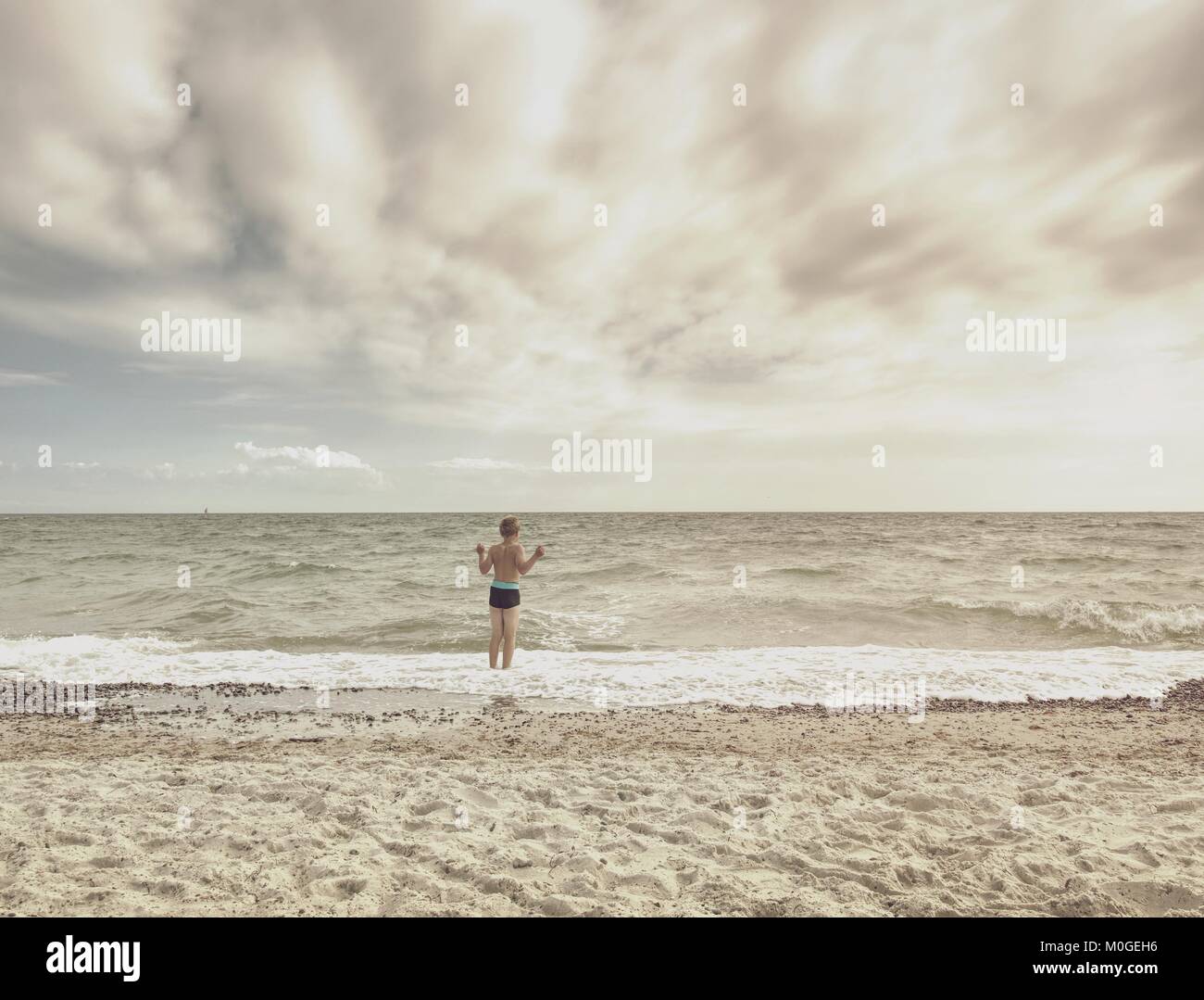 Black Haired Boy High Resolution Stock Photography and Images - Alamy