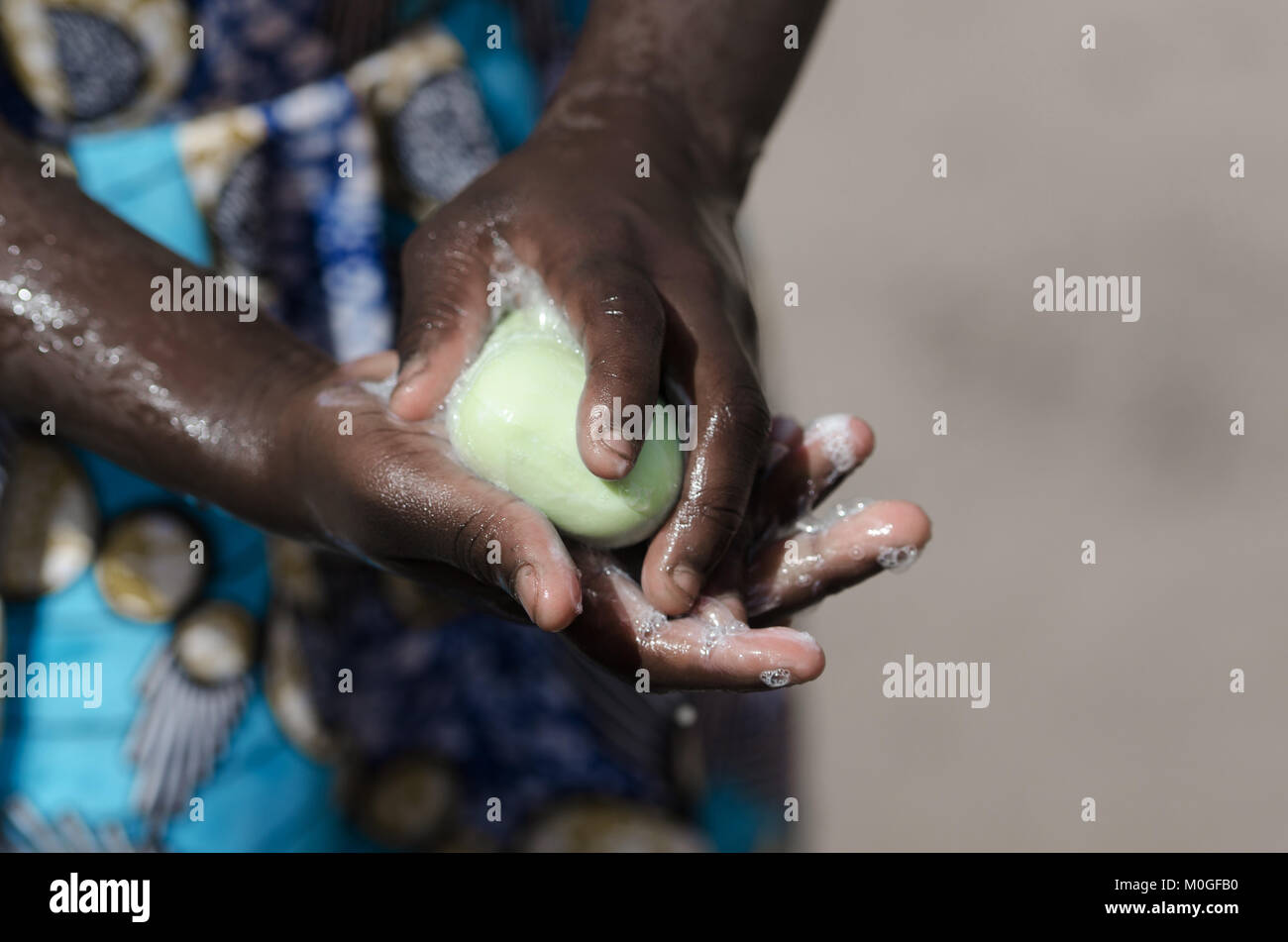 Washing up hands african hi-res stock photography and images - Alamy