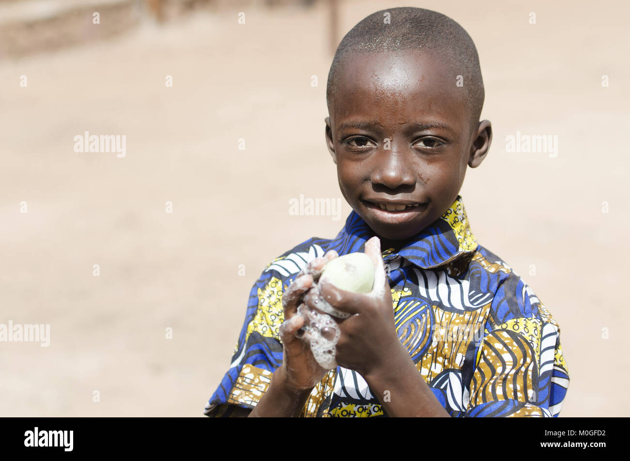 Awesome Black African Boy Washing Hands Water Soap Stock Photo - Alamy
