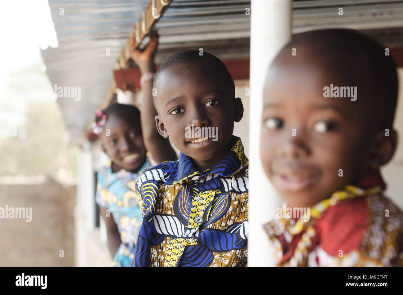 Three African Children Smiling and Laughing outdoors Stock Photo - Alamy