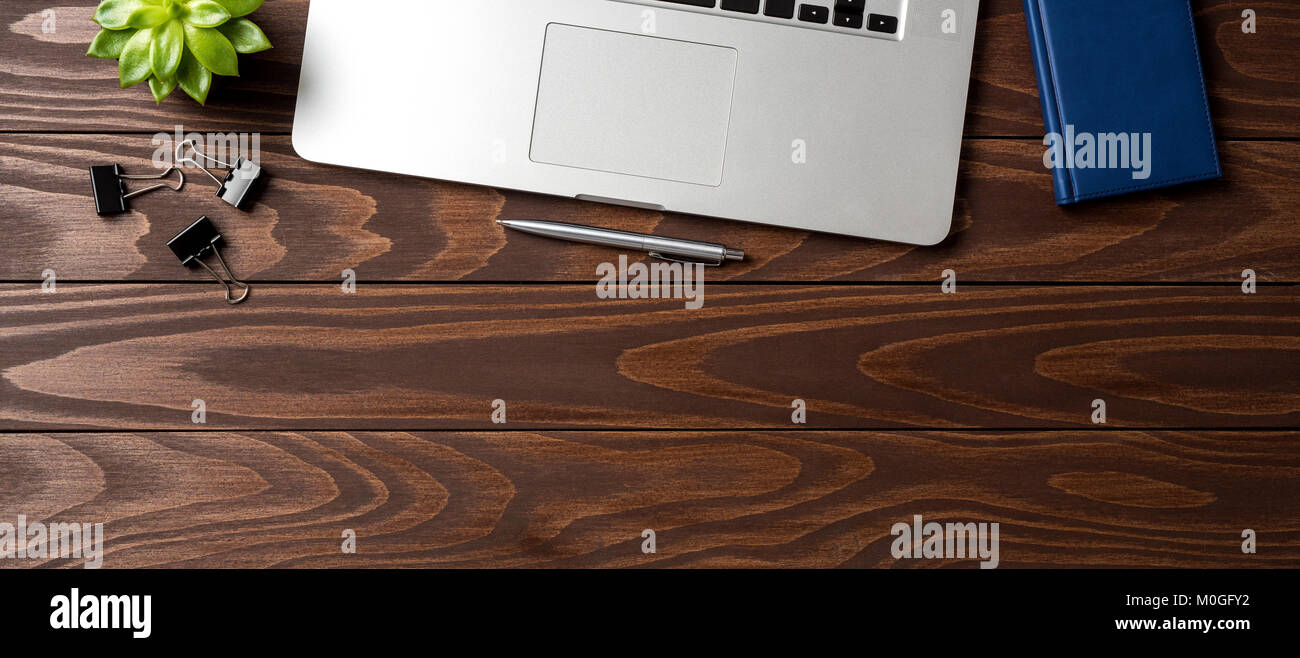 Overhead shot of wooden office desktop Stock Photo - Alamy