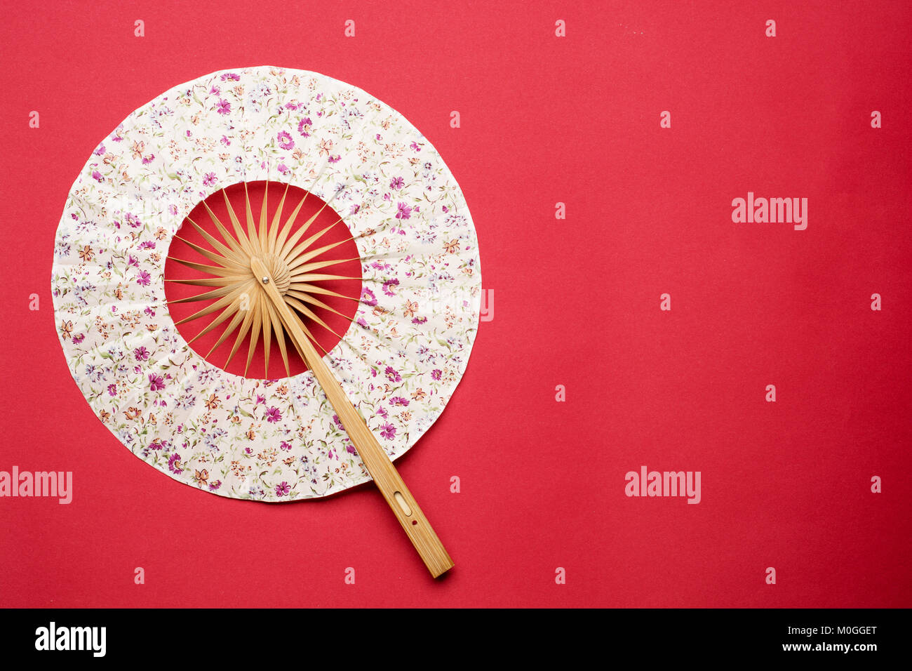 Japanese folding fan isolated on white background Stock Photo - Alamy