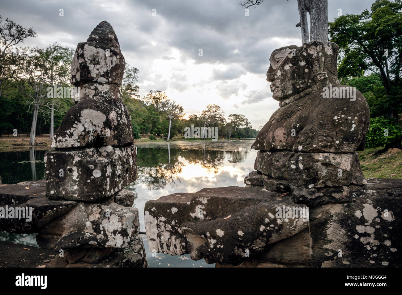 Statues on bridge at South Gate, Bayon Temple, Angkor Thom, Cambodia ...