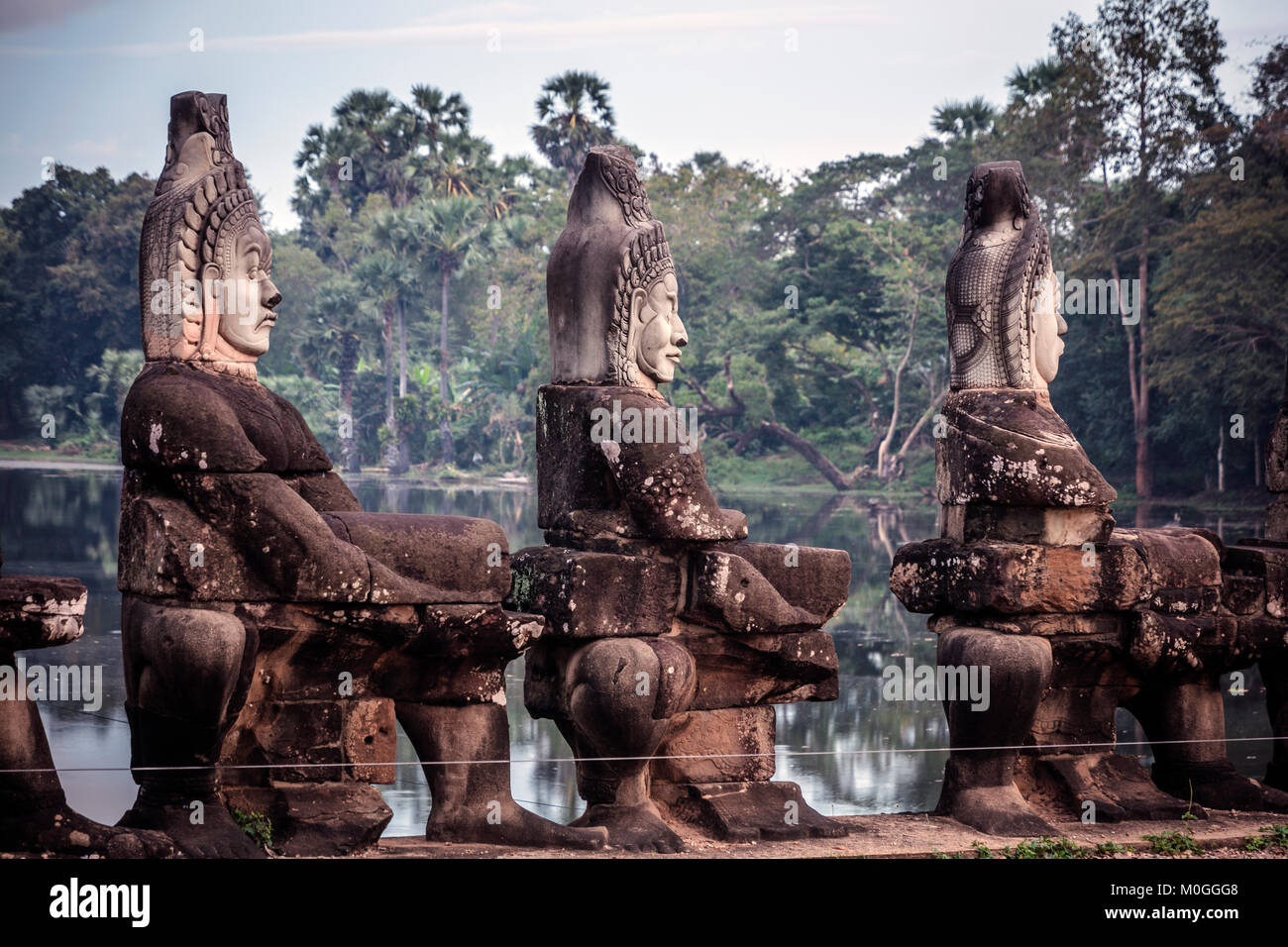 Statues on bridge at South Gate, Bayon Temple, Angkor Thom, Cambodia ...