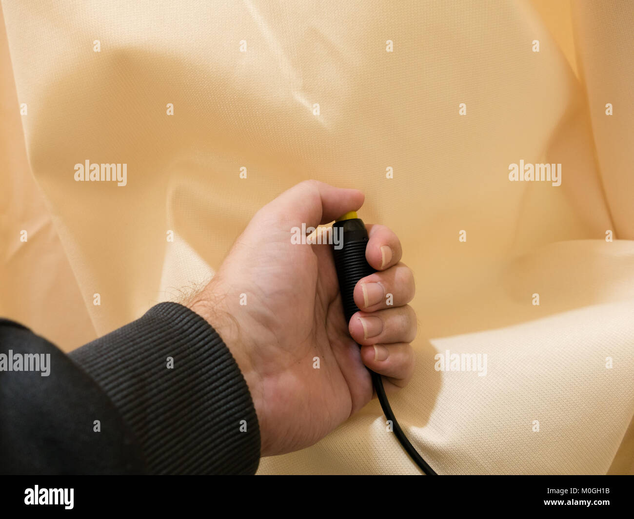 Man's hand pressing emergency buzzer for nurse Stock Photo - Alamy