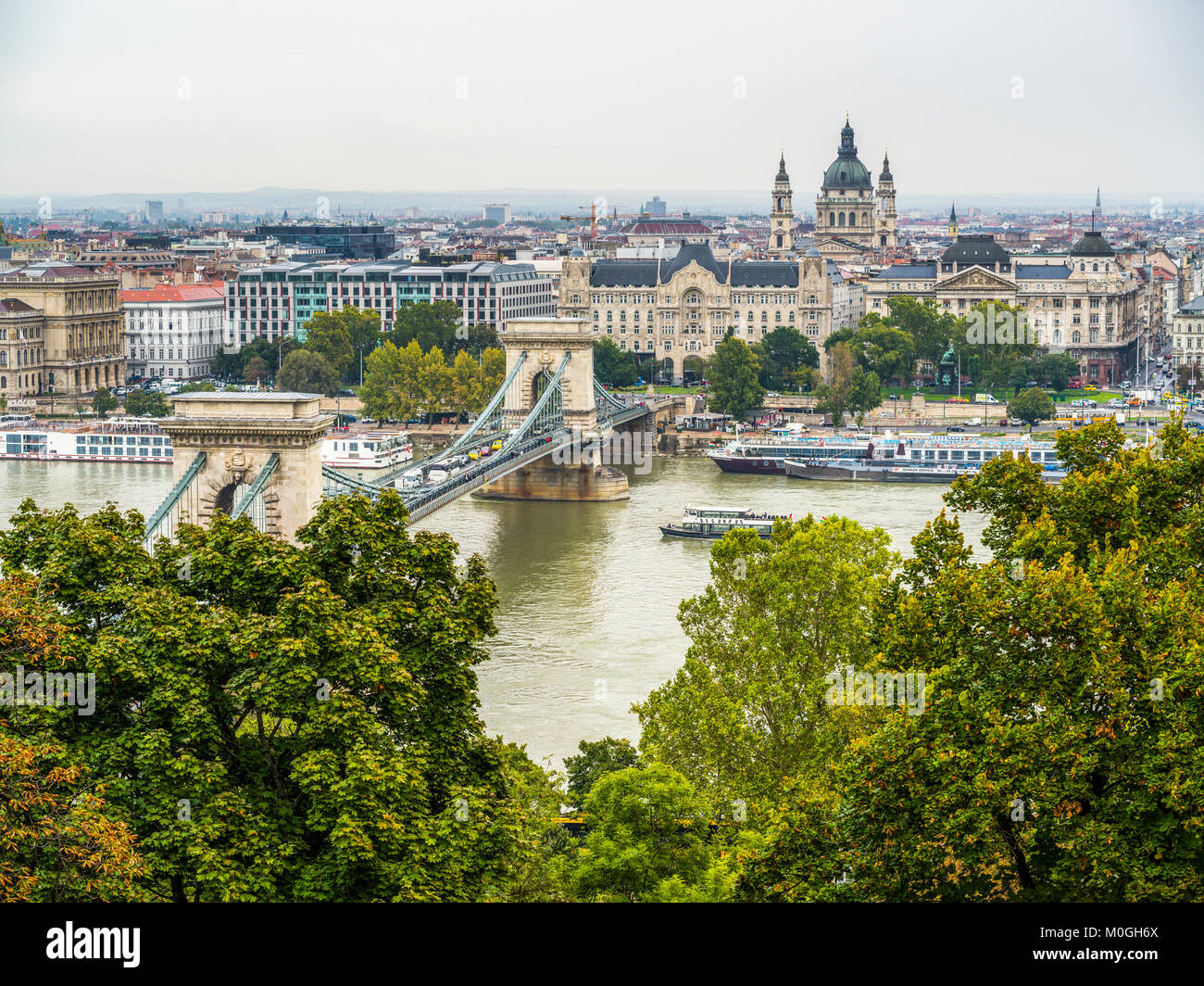 Boats on the Danube River and cityscape of Budapest; Budapest, Budapest ...