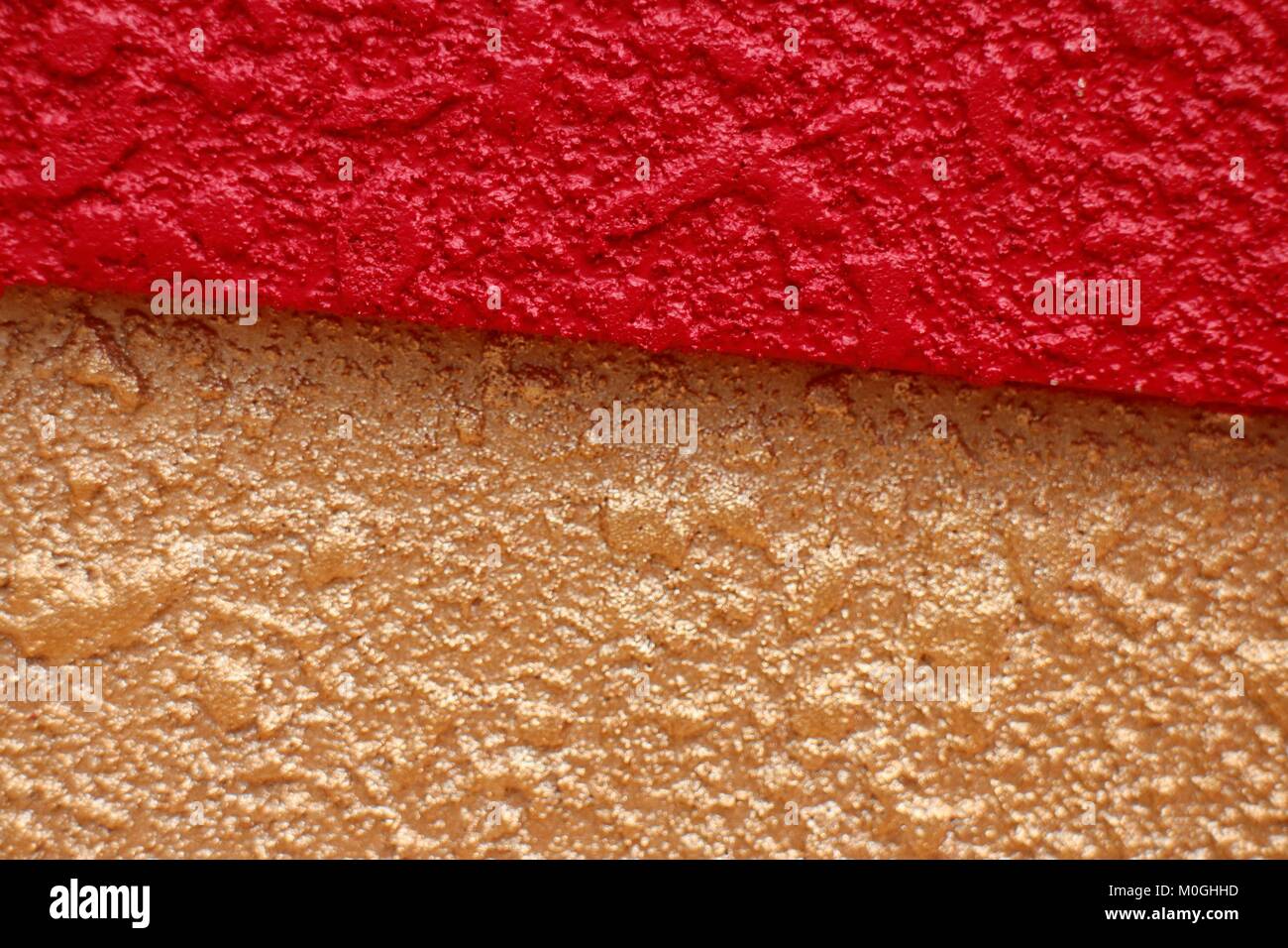 Gold and red textured close-up background Stock Photo - Alamy