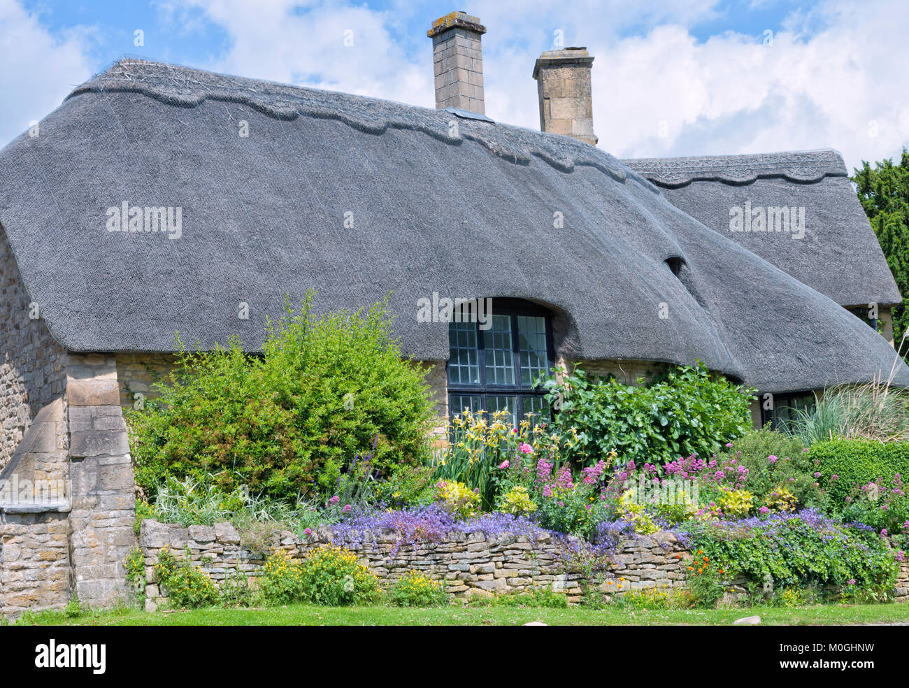 Stone Cottage Thatched Roof Stock Photos & Stone Cottage Thatched Roof ...