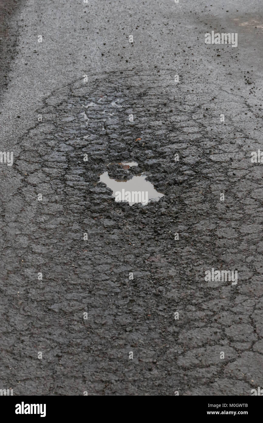 Road defects hi-res stock photography and images - Alamy