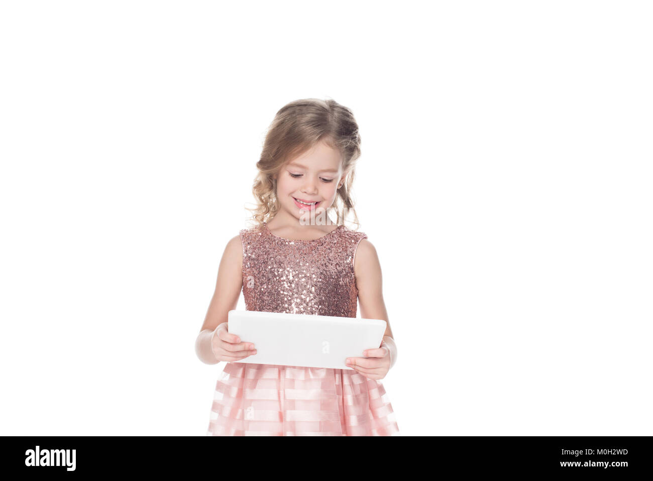 adorable kid using digital tablet, isolated on white Stock Photo - Alamy