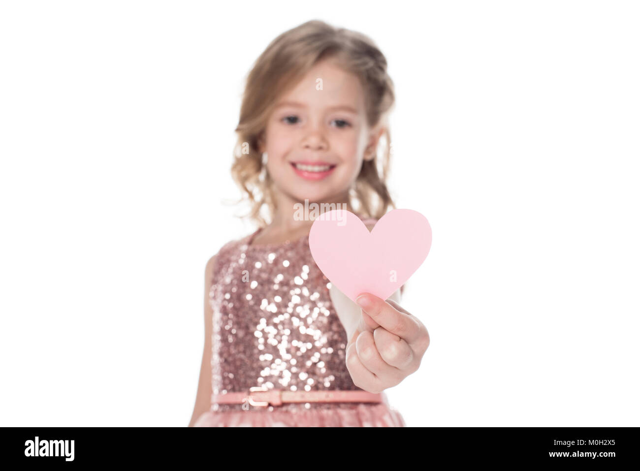 adorable happy child holding heart, isolated on white Stock Photo - Alamy