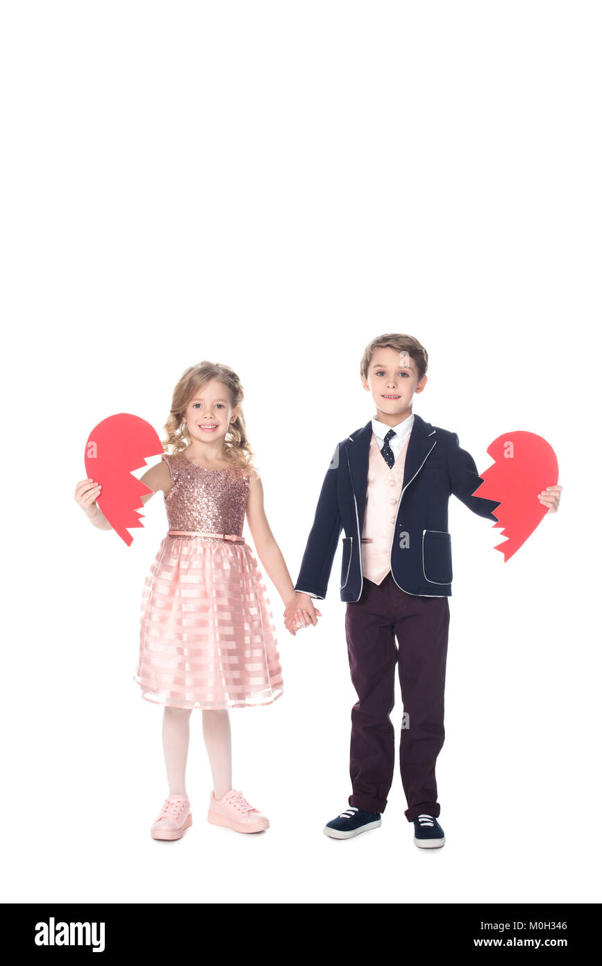 beautiful little children holding pieces of broken heart symbol and ...