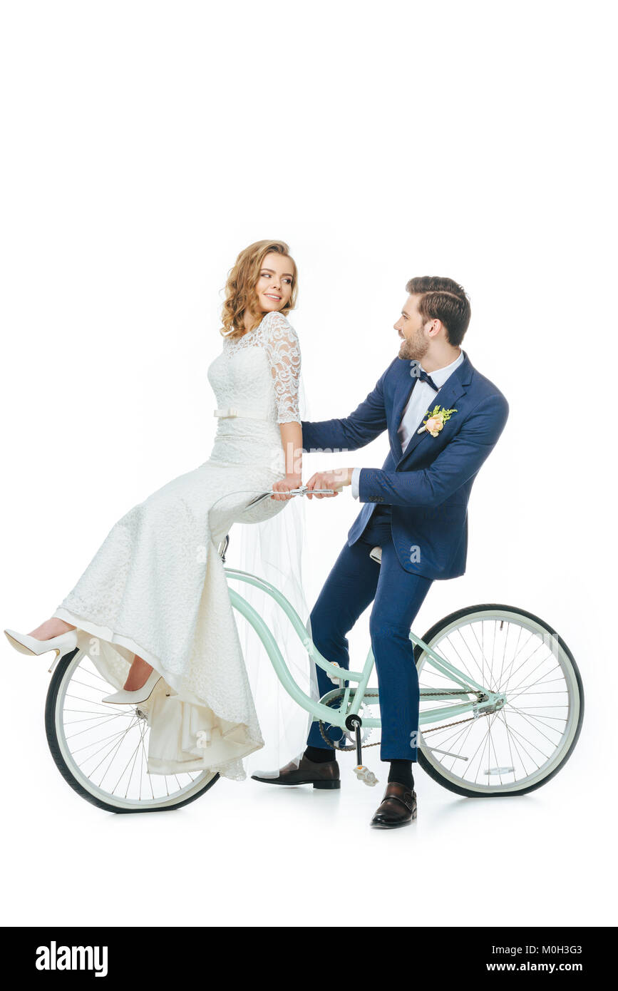Caucasian woman riding bicycle Cut Out Stock Images & Pictures - Alamy