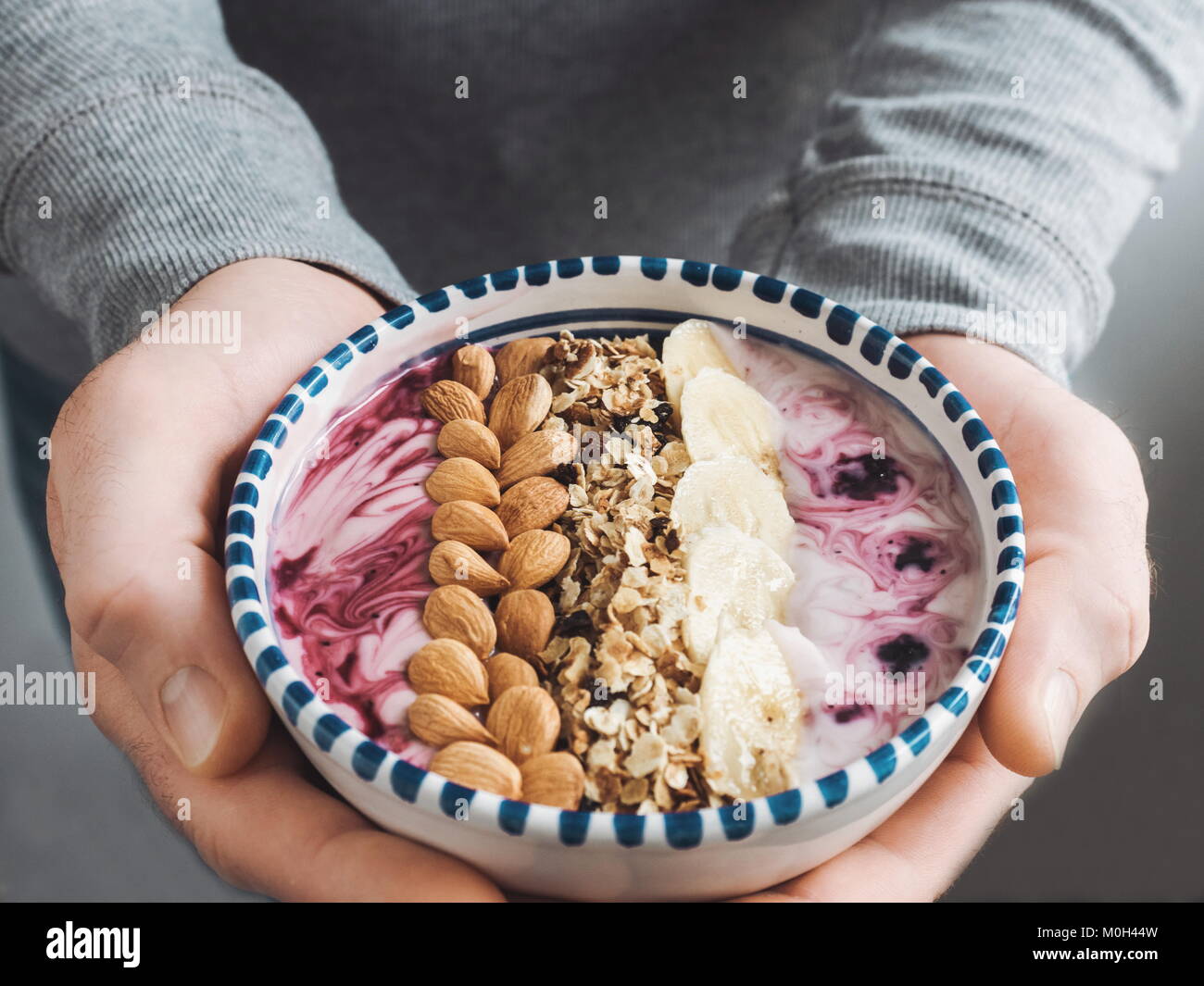 Healthy food - berry smoothie and muesli Stock Photo - Alamy