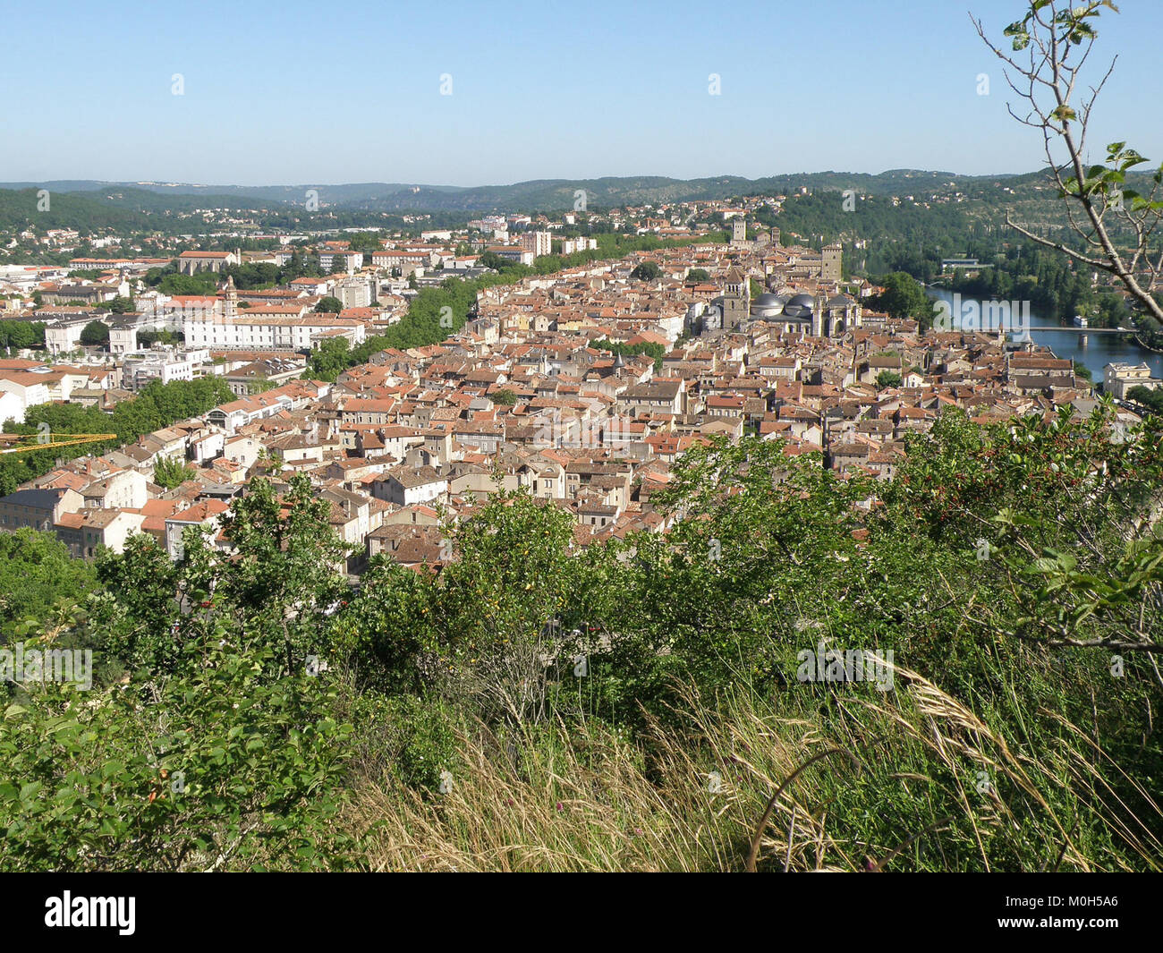 A panoramic view of the city of Cahors in France. The image captures ...