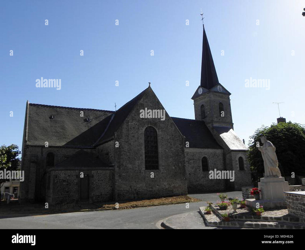 This photograph depicts the church in Brains-sur-les-Marches, France, highlighting its ...