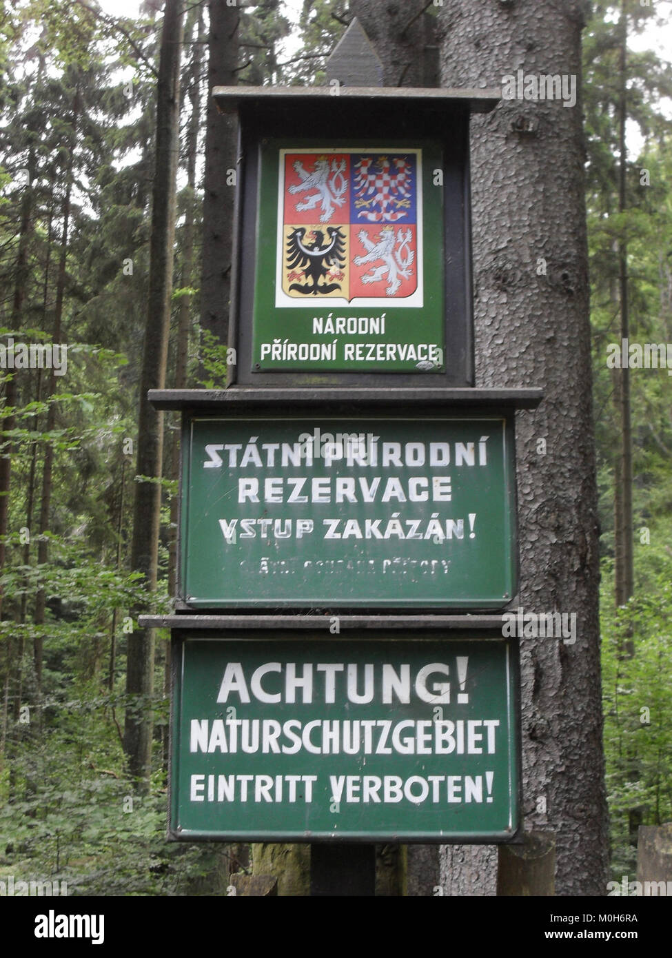 This photograph shows a warning sign (varovná cedule) in the Boubín ...